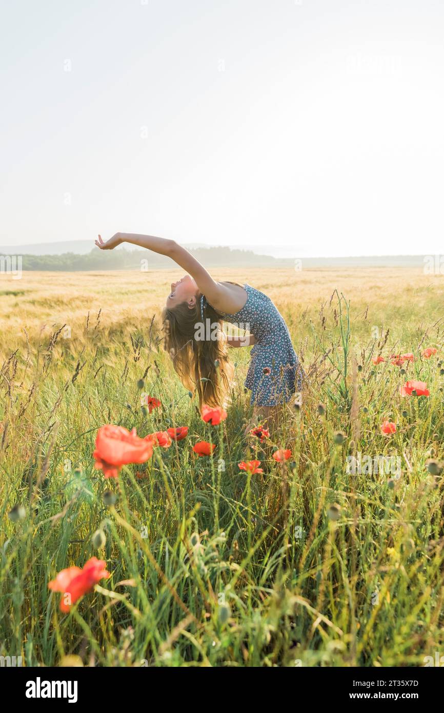 Bending over girl hi-res stock photography and images - Alamy