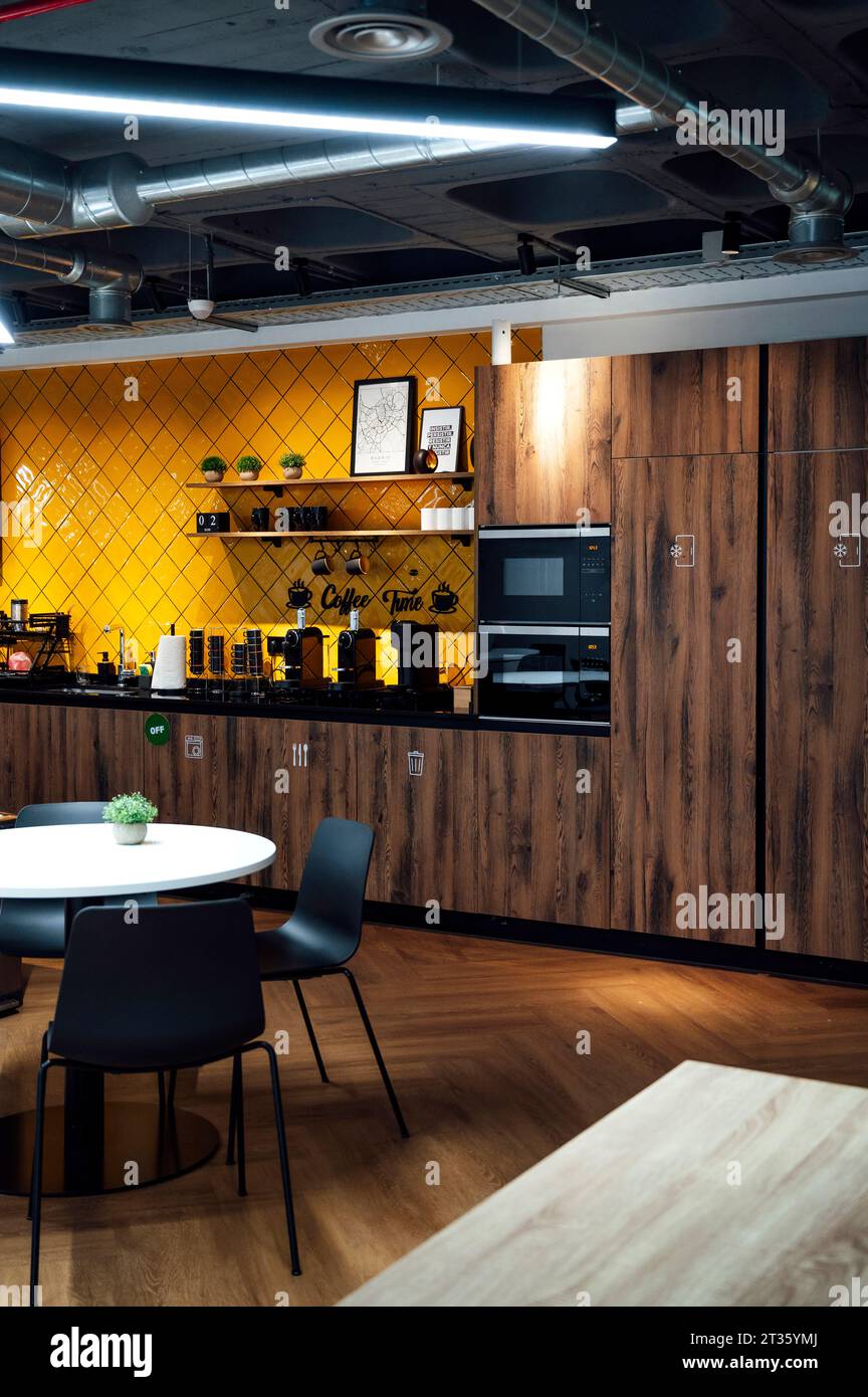 Empty cafeteria with chairs and table in modern office Stock Photo - Alamy
