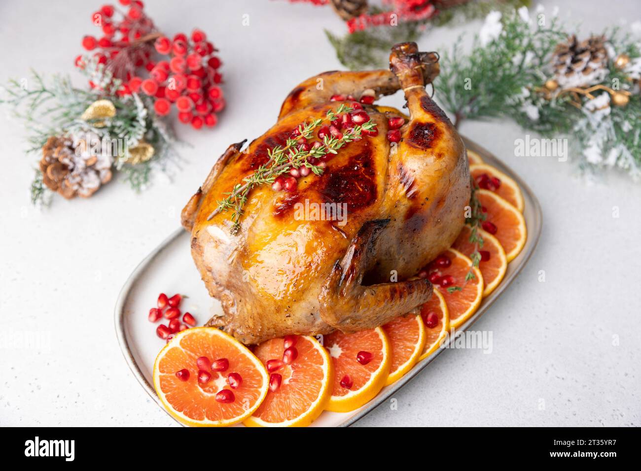 Chicken baked whole to appetizing crispy crust with pomegranate and red ...