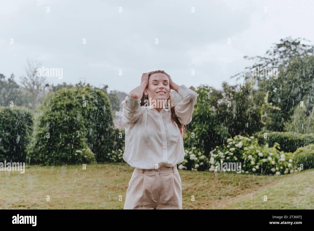Female enjoying rain hi-res stock photography and images - Alamy