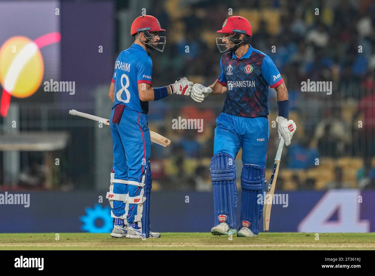 Afghanistan's Ibrahim Zardan, left, and Rahmat Shah encourage each ...