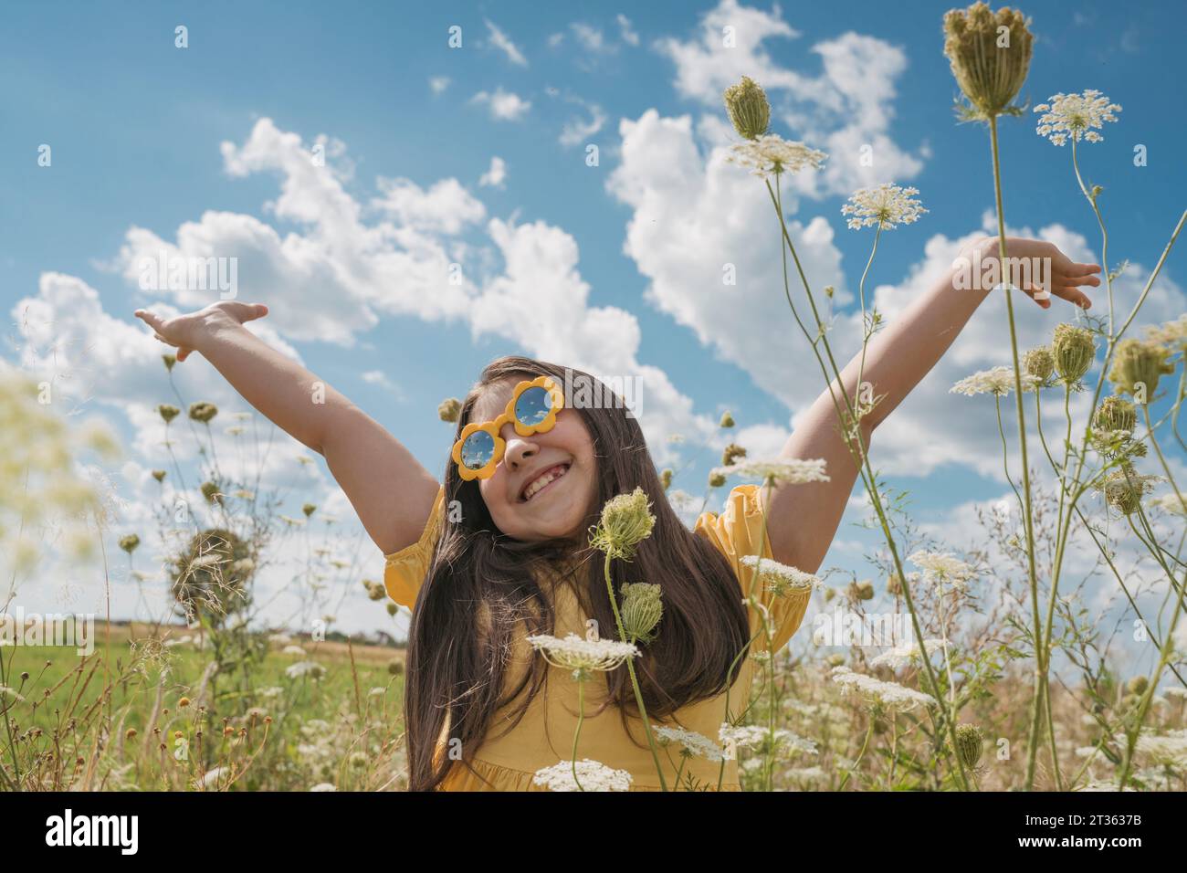 Girl raised hands hi-res stock photography and images - Alamy