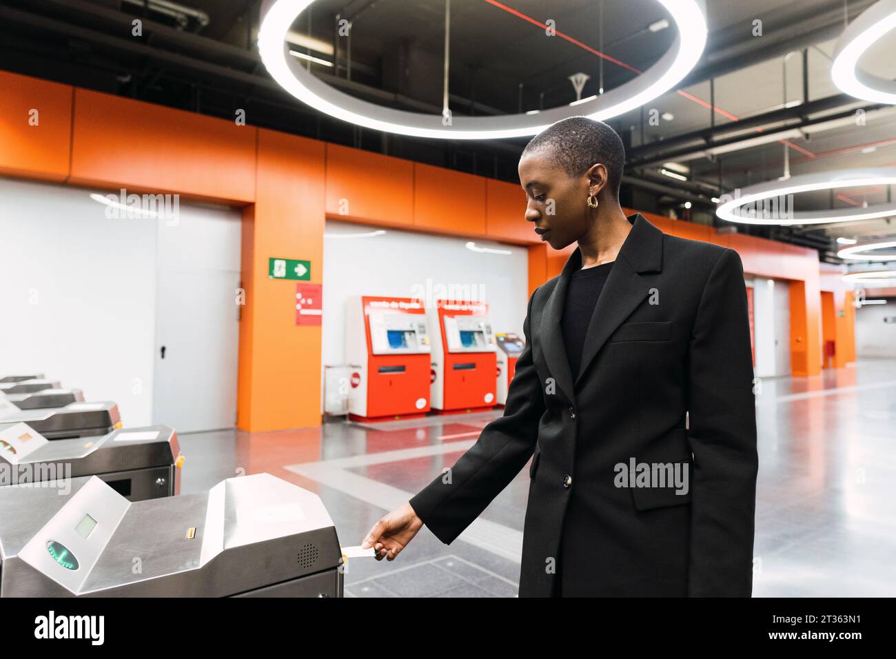 Woman taking ticket hi-res stock photography and images - Alamy