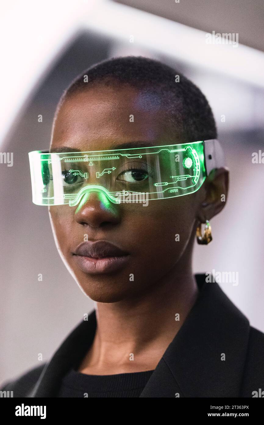 Young woman wearing futuristic smart glasses Stock Photo - Alamy