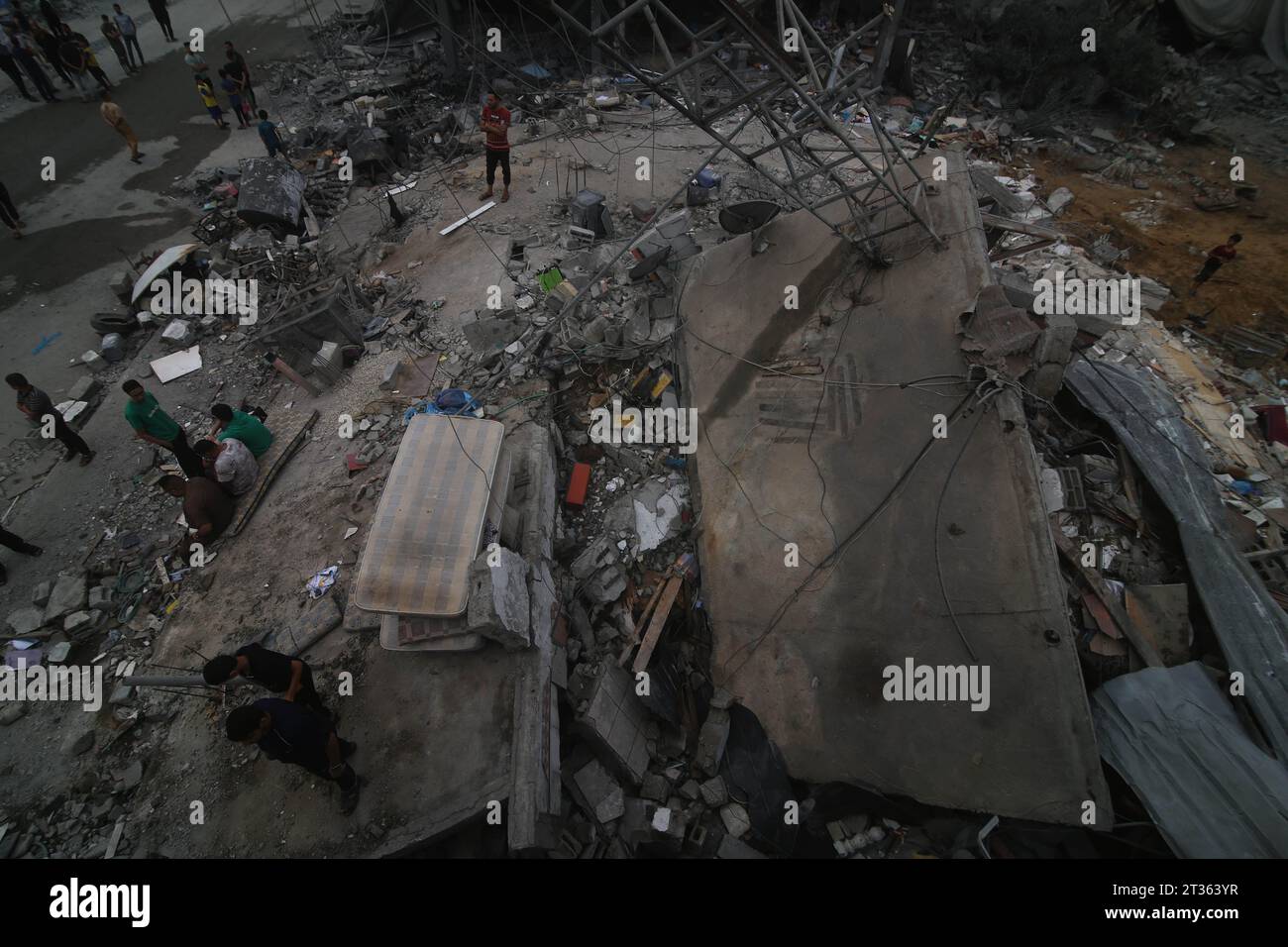 Rafah. 23rd Oct, 2023. People inspect buildings destroyed in airstrikes ...