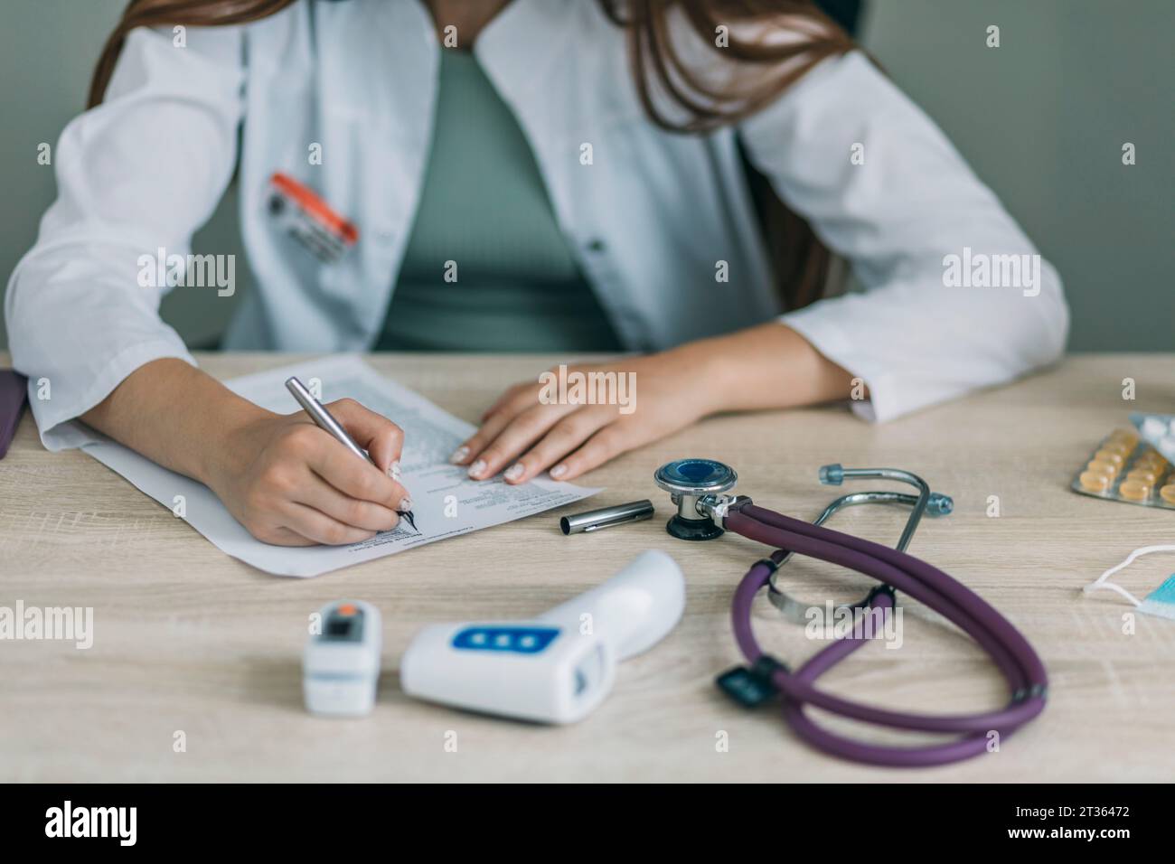 Female doctor stethoscope prescription hi-res stock photography and ...