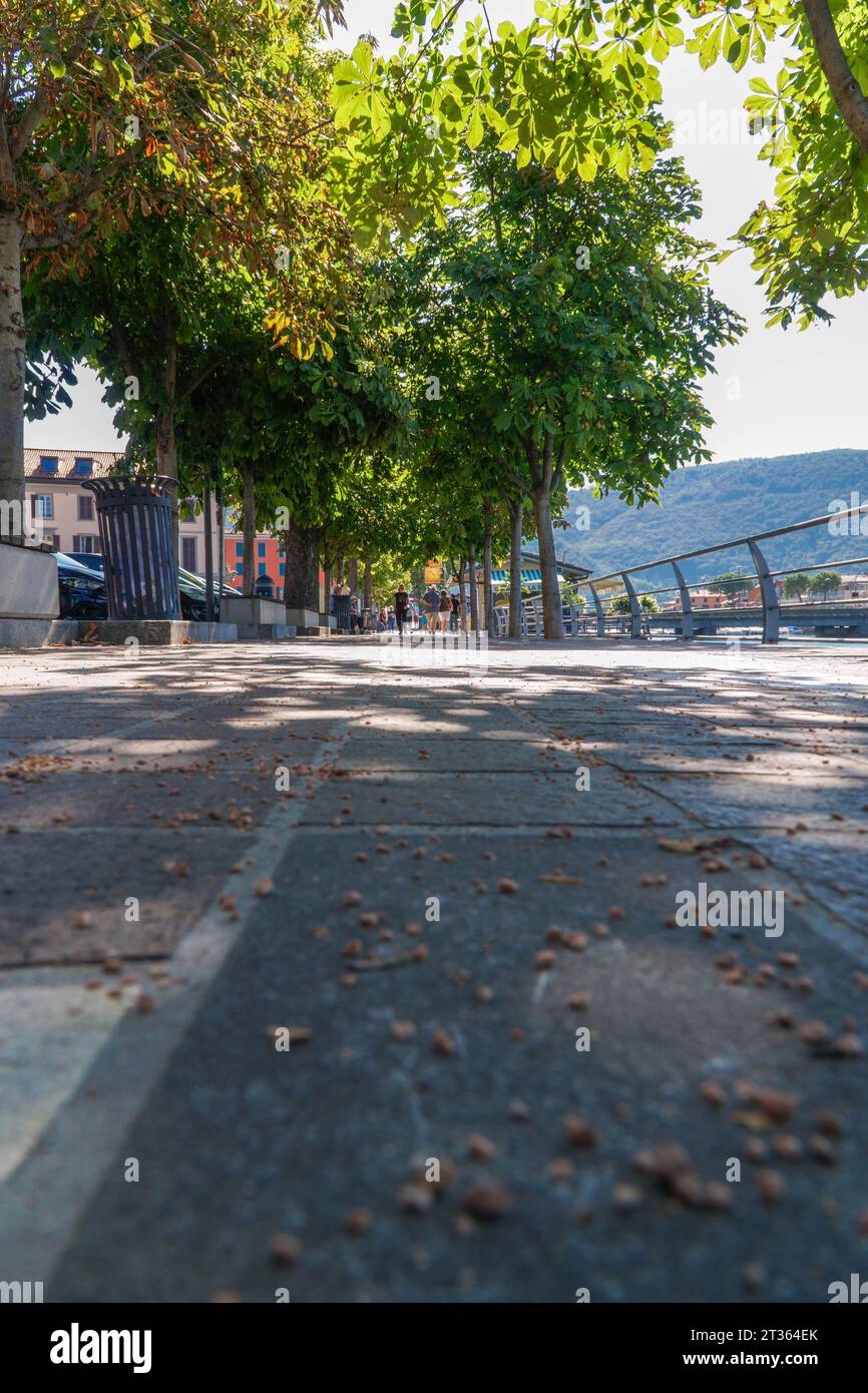 Low angle view along the promenade of Lake Iseo Sarnico Lombardy Italy ...
