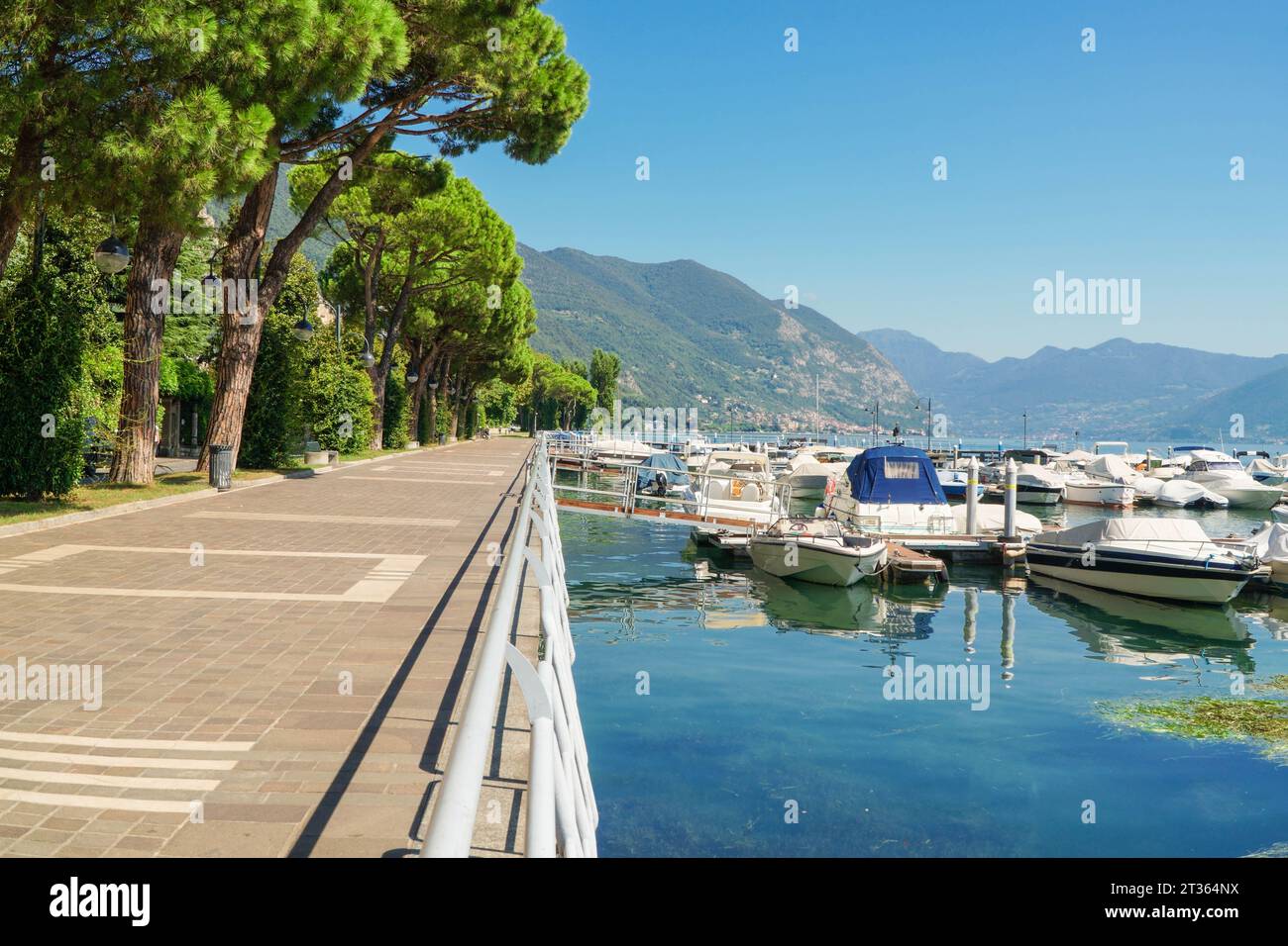 View along the sidewalk of Lake Iseo Sarnico Lombardy Italy. September ...