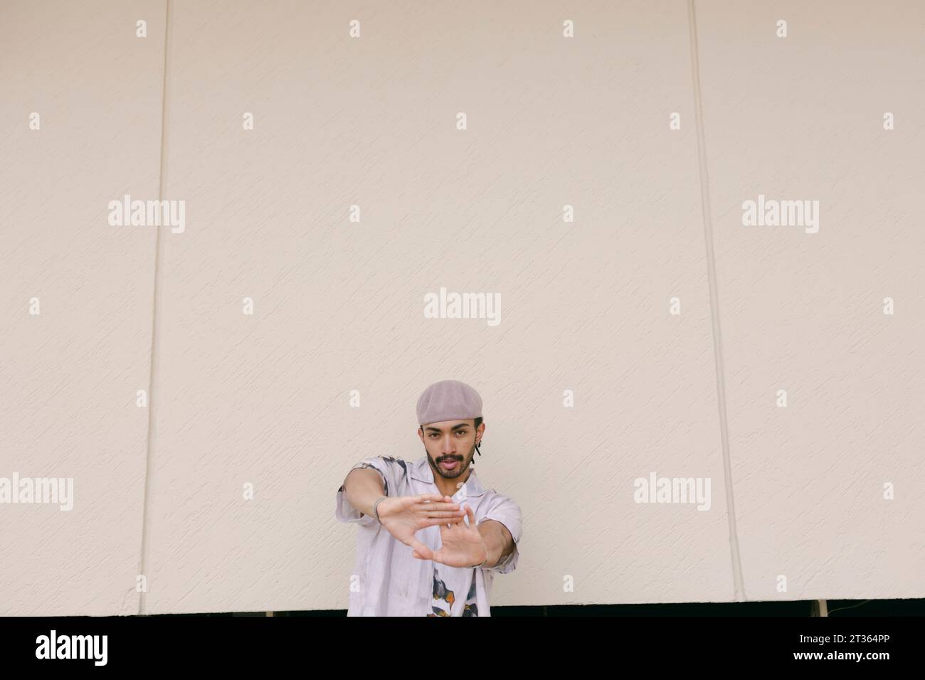 Young man wearing sign hi-res stock photography and images - Alamy