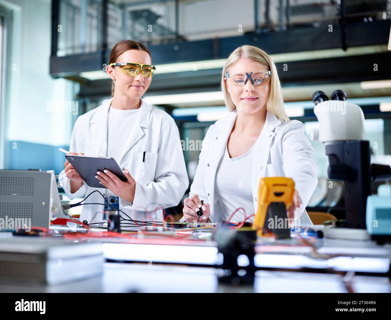 Scientists working in laboratory circuit hi-res stock photography and ...