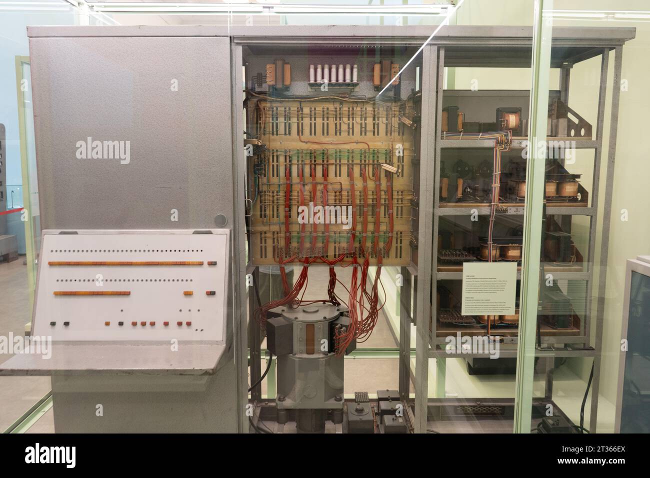 The first old computer. Retro device. Large cabinet with wires ...