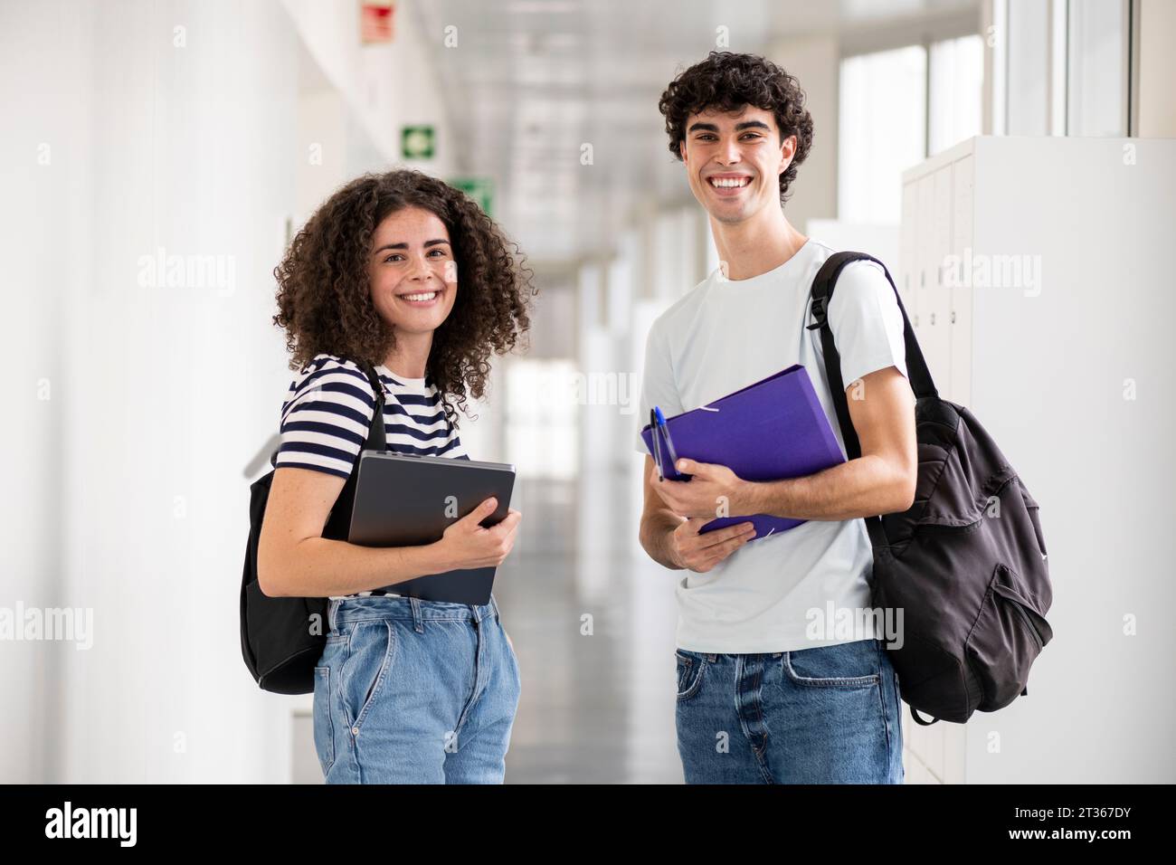 Portrait students holding laptop hi-res stock photography and images ...