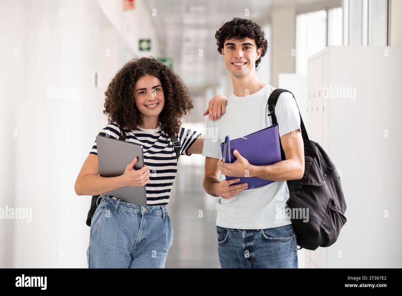 Portrait students holding laptop hi-res stock photography and images ...