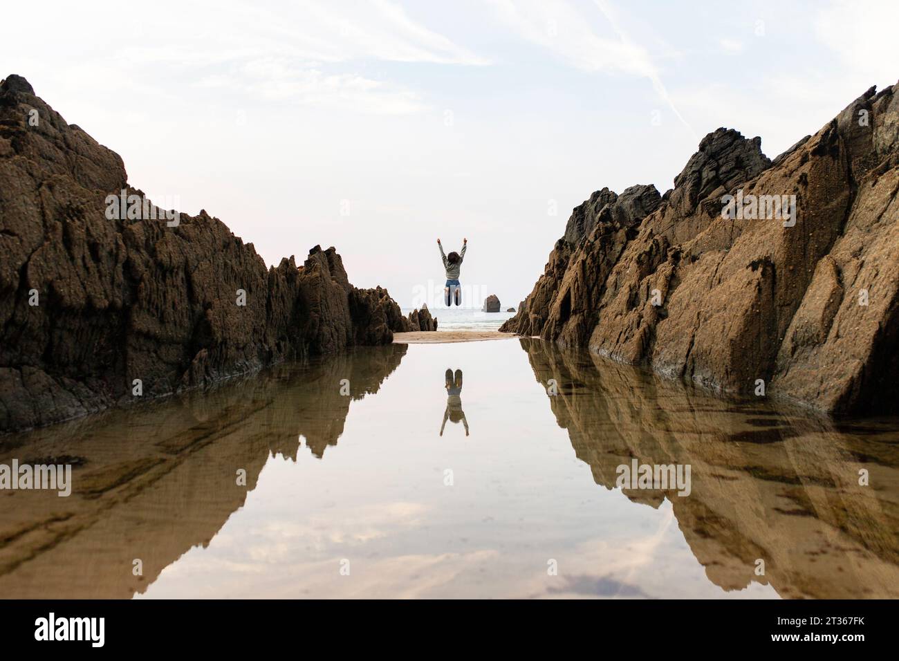 Adult female jump puddle hi-res stock photography and images - Alamy