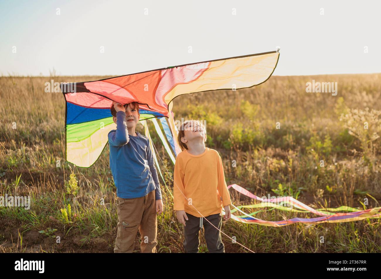 Holding kite hi-res stock photography and images - Alamy