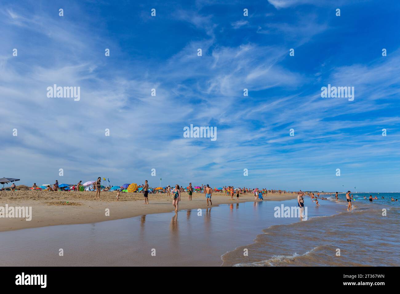Tavira, Portugal - August 15, 2023: People at the famous beach of ...