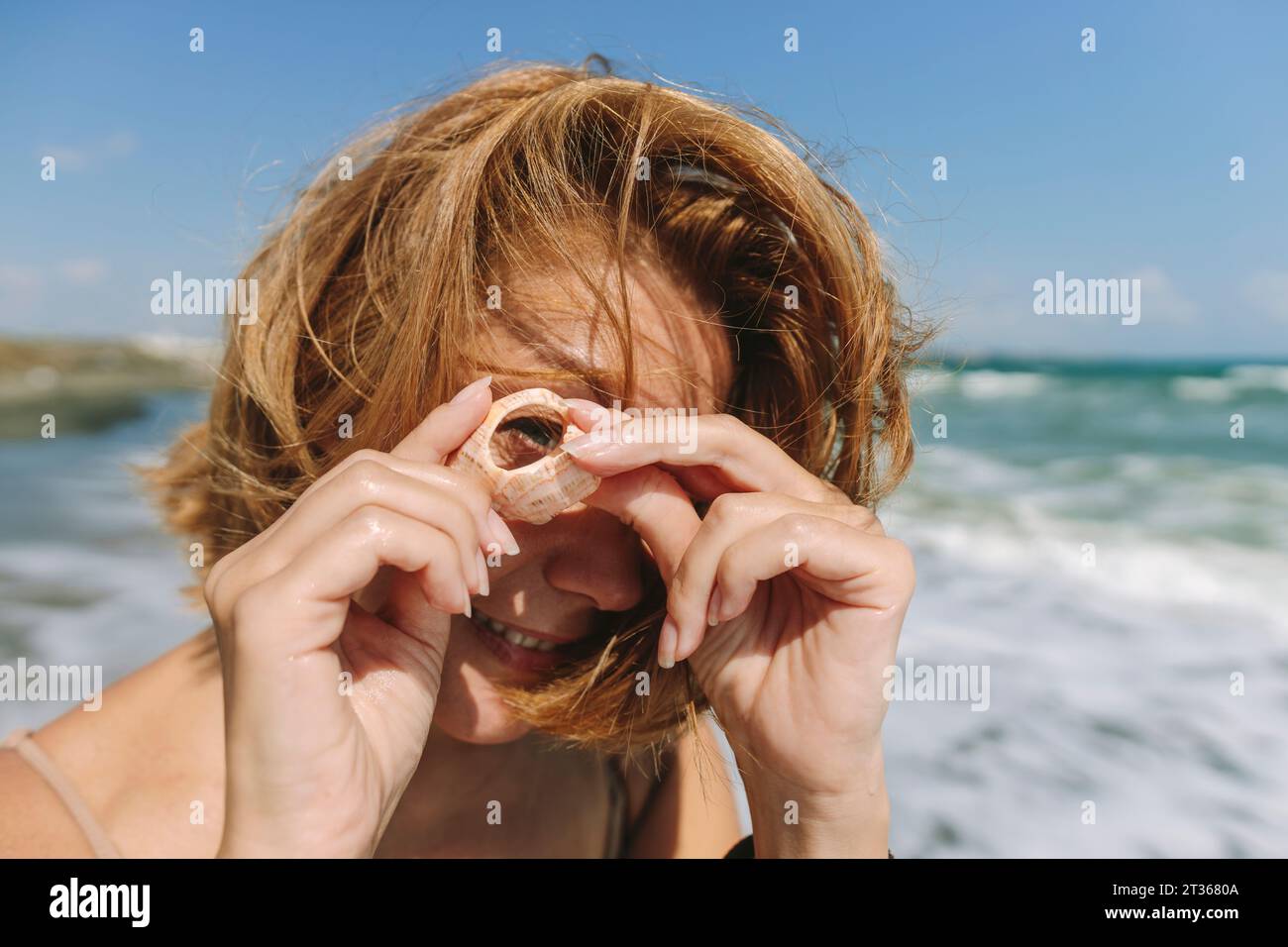 Mature woman sea shell hi-res stock photography and images - Alamy