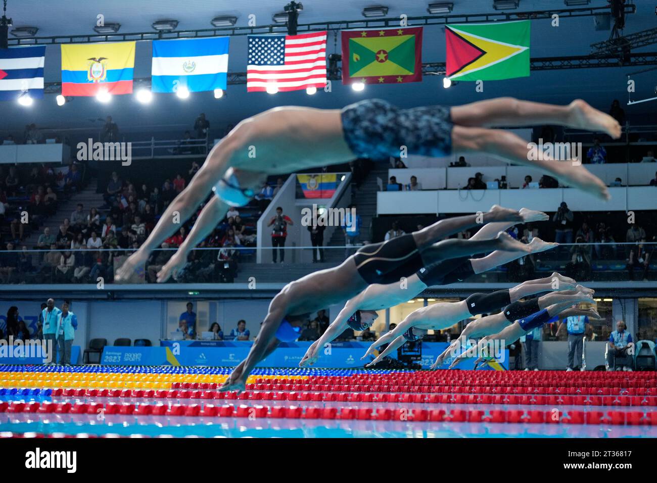 Swimmers start a men's 100-meters freestyle heat at the Pan American ...