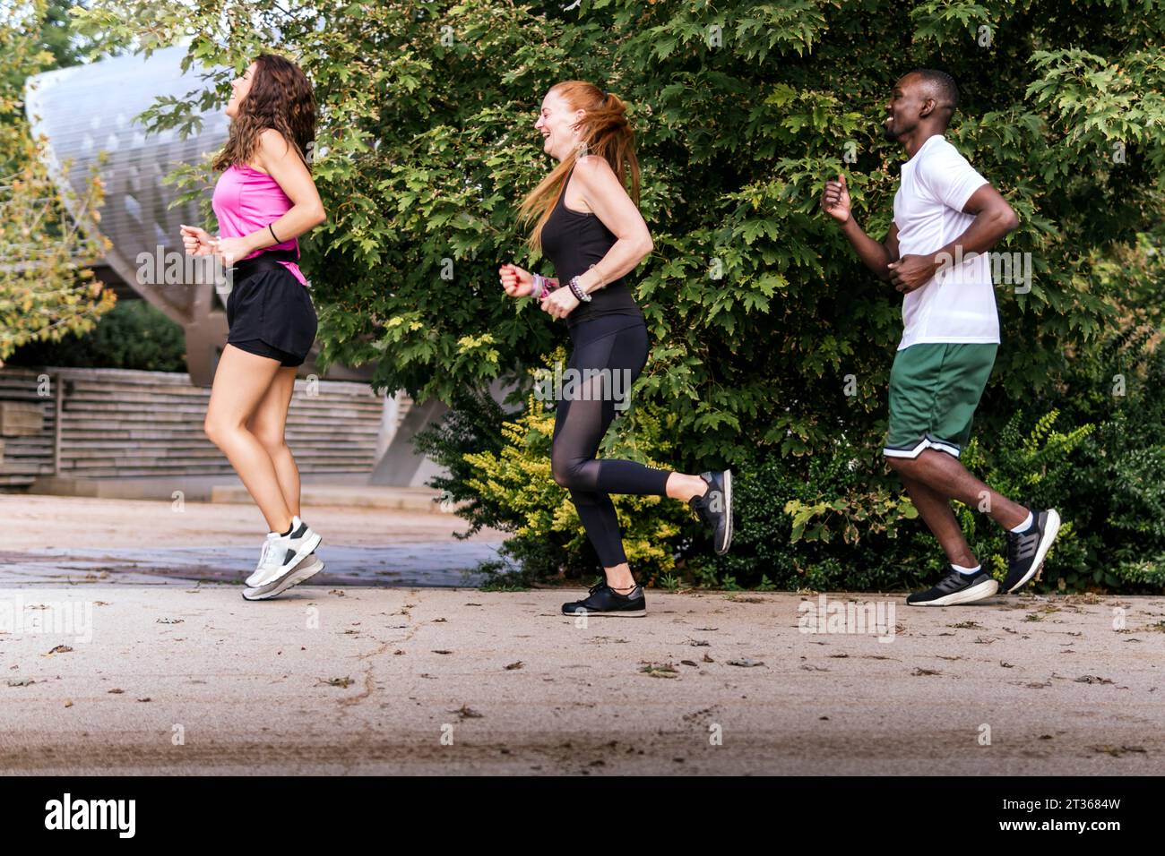 Women running on park hi-res stock photography and images - Alamy