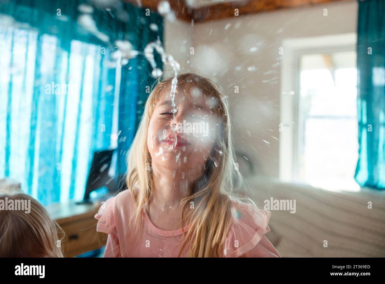Water spitting from mouth hi-res stock photography and images - Alamy
