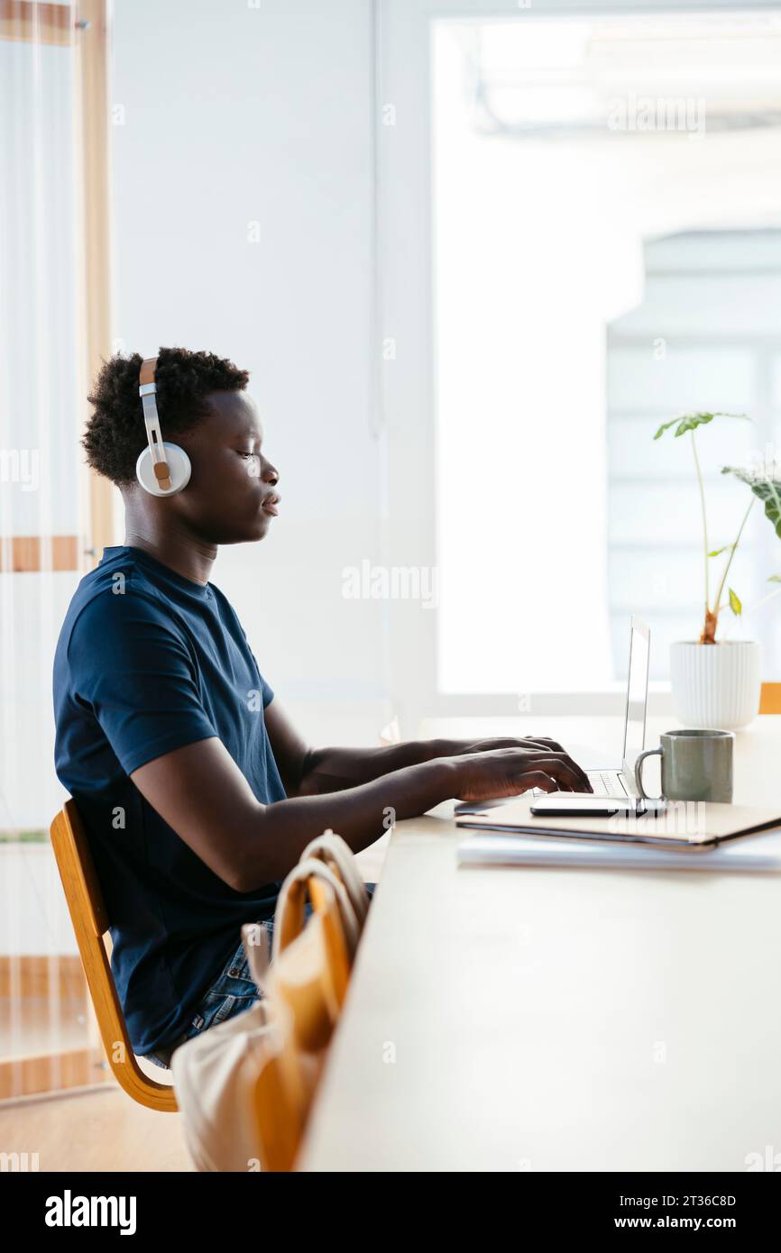 Wireless headphones on side table hi-res stock photography and images ...