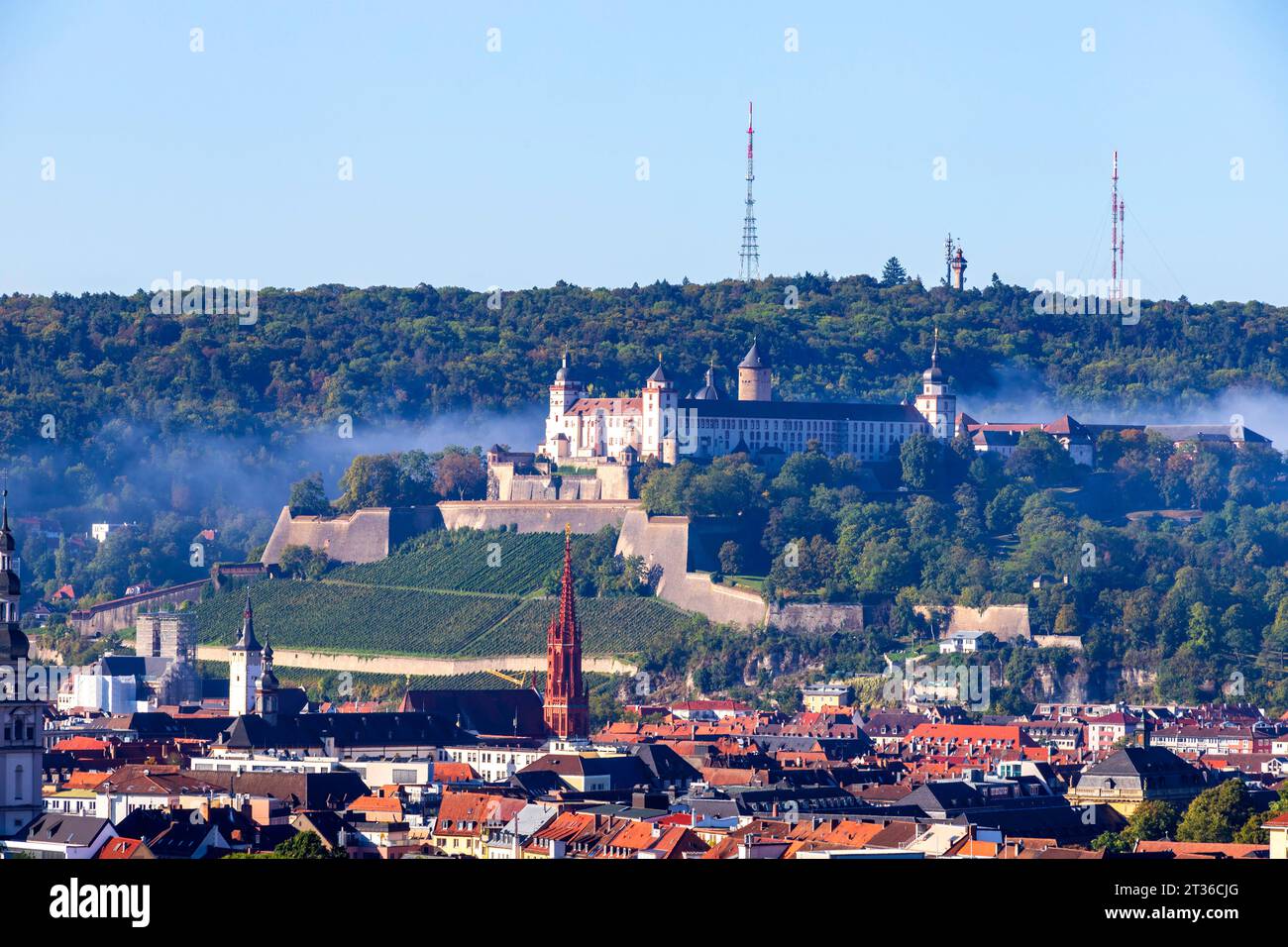 Germany, Bavaria, Wurzburg, Fog gathering over Marienberg Fortress ...
