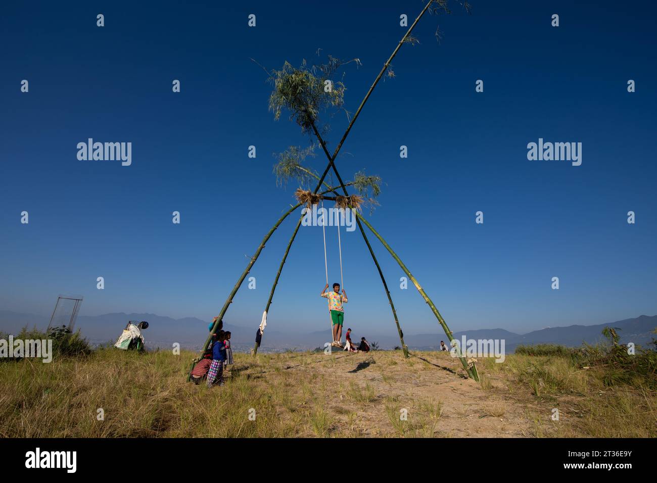 Playing swing on the precious occasion of the Dashain Festival, in ...