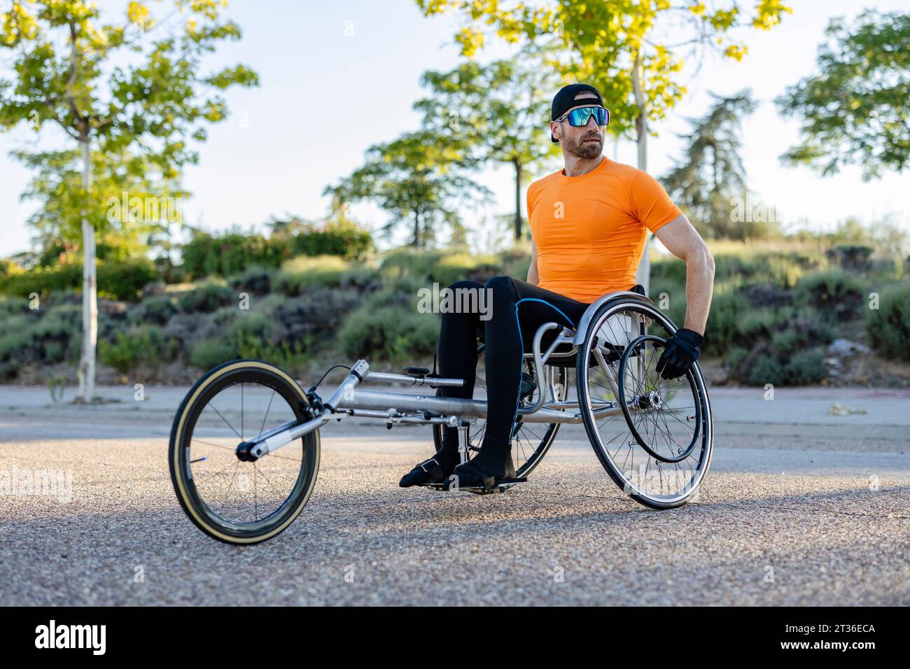 Mature sportsman with physical disabilities taking part in race ...