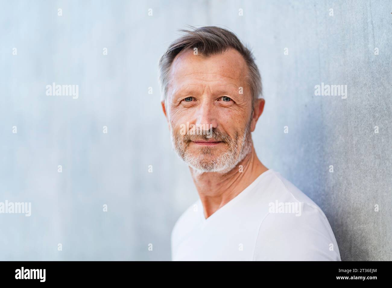 Man in white shirt beard hi-res stock photography and images - Alamy