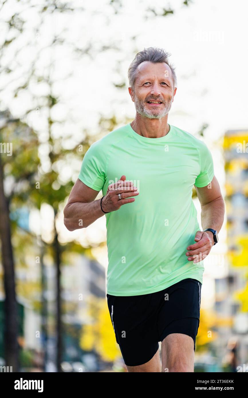 Healthy active sportsman training hi-res stock photography and images ...