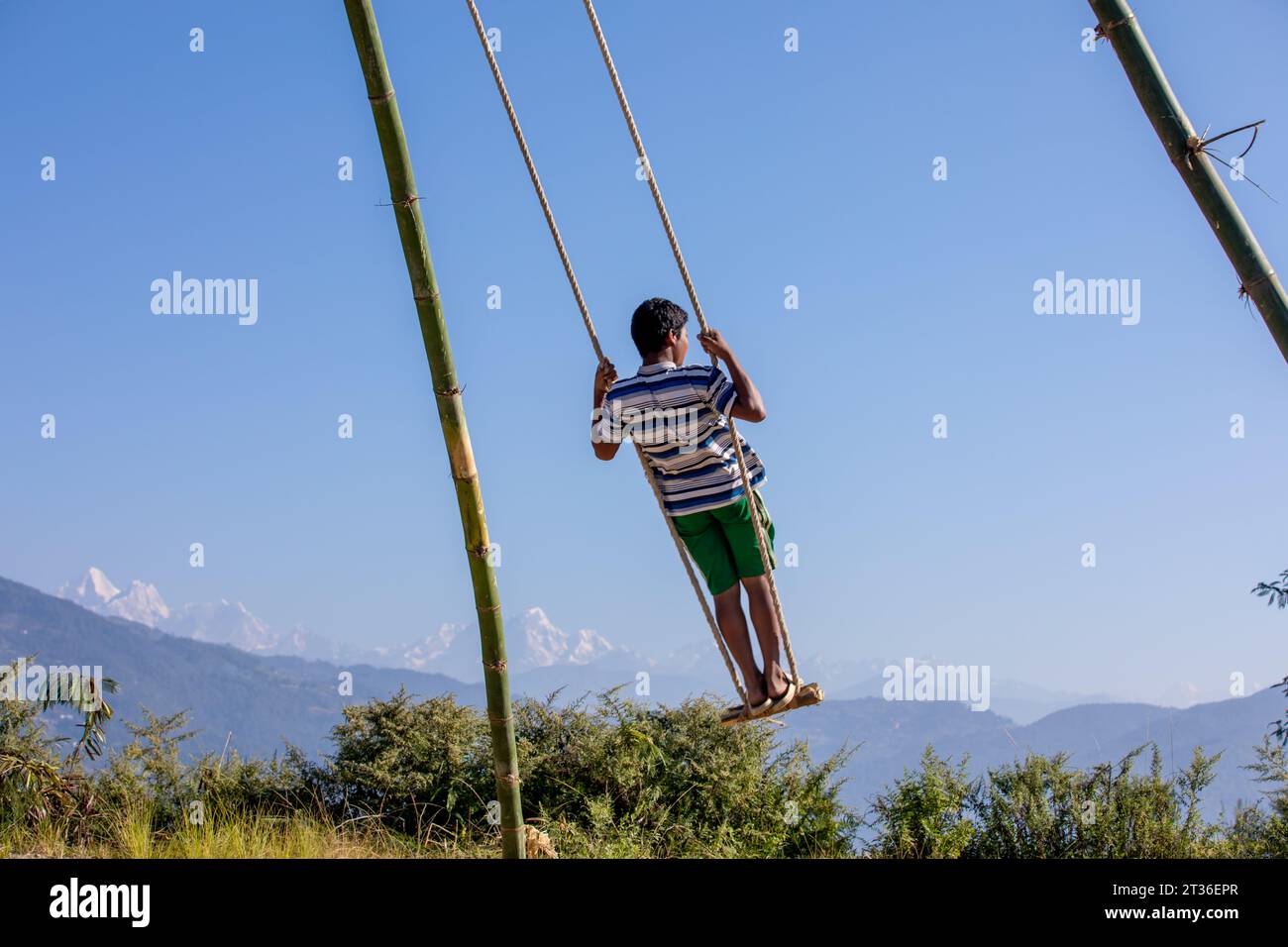 Playing swing on the precious occasion of the Dashain Festival, in ...