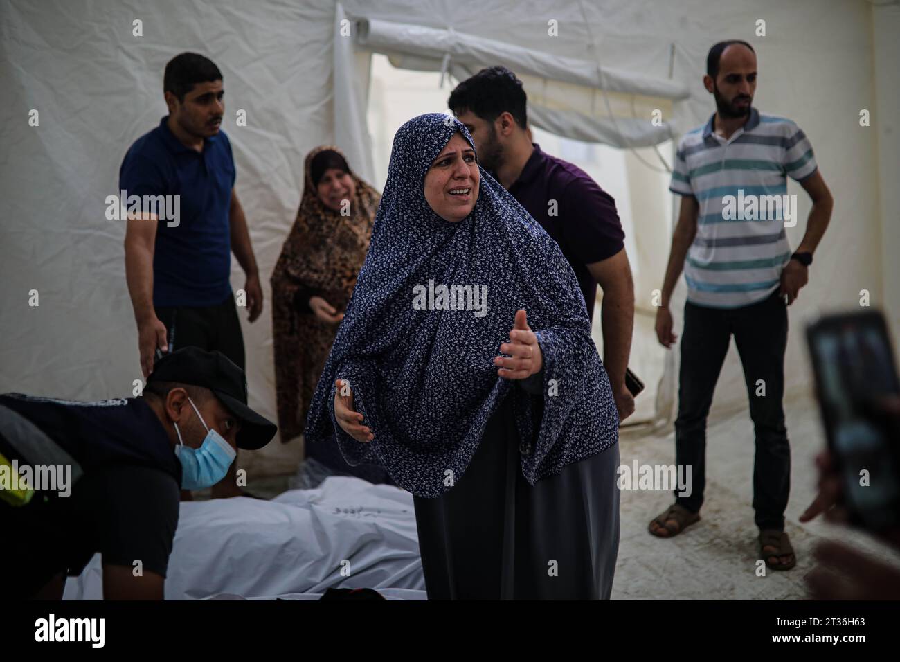 October 23, 2023: Gaza, Palestine. 23 October 2023. A woman mourns her child killed in the ...