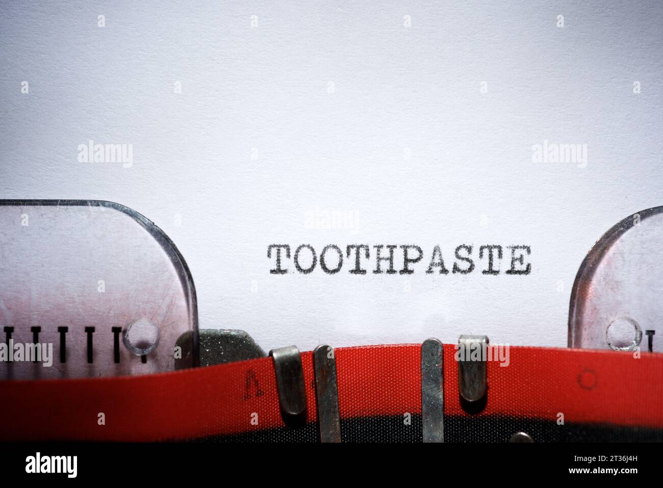 Toothpaste word written with a typewriter Stock Photo - Alamy