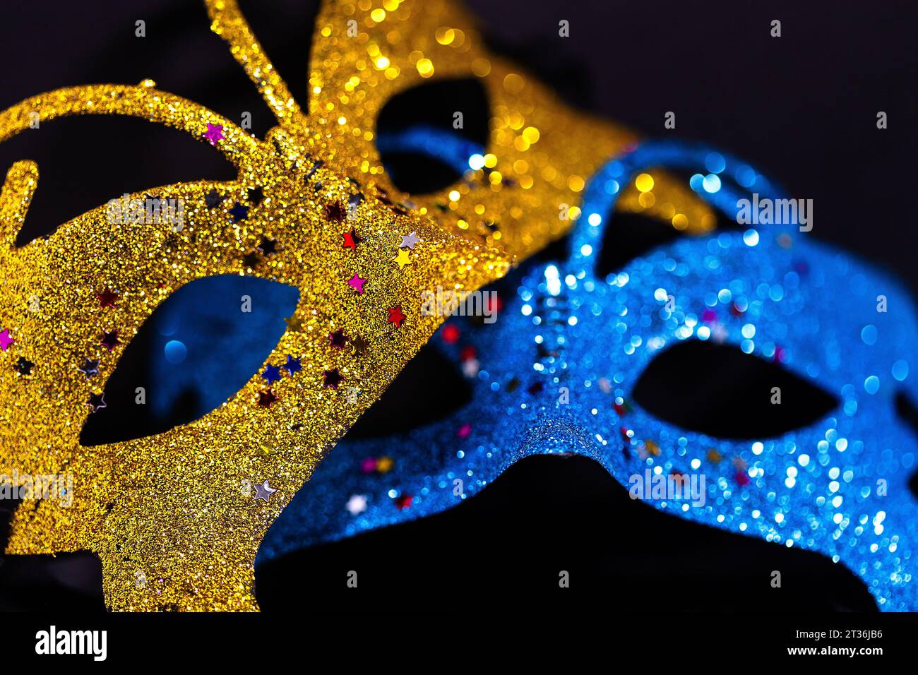 Luxurious Venetian shiny masks on a dark background. Carnival ...