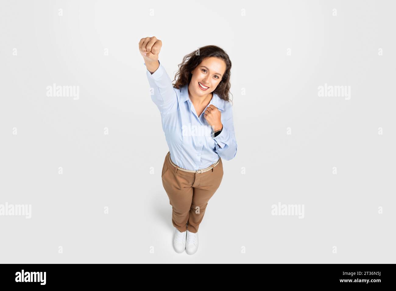 Young woman extends arm forward hi-res stock photography and images - Alamy