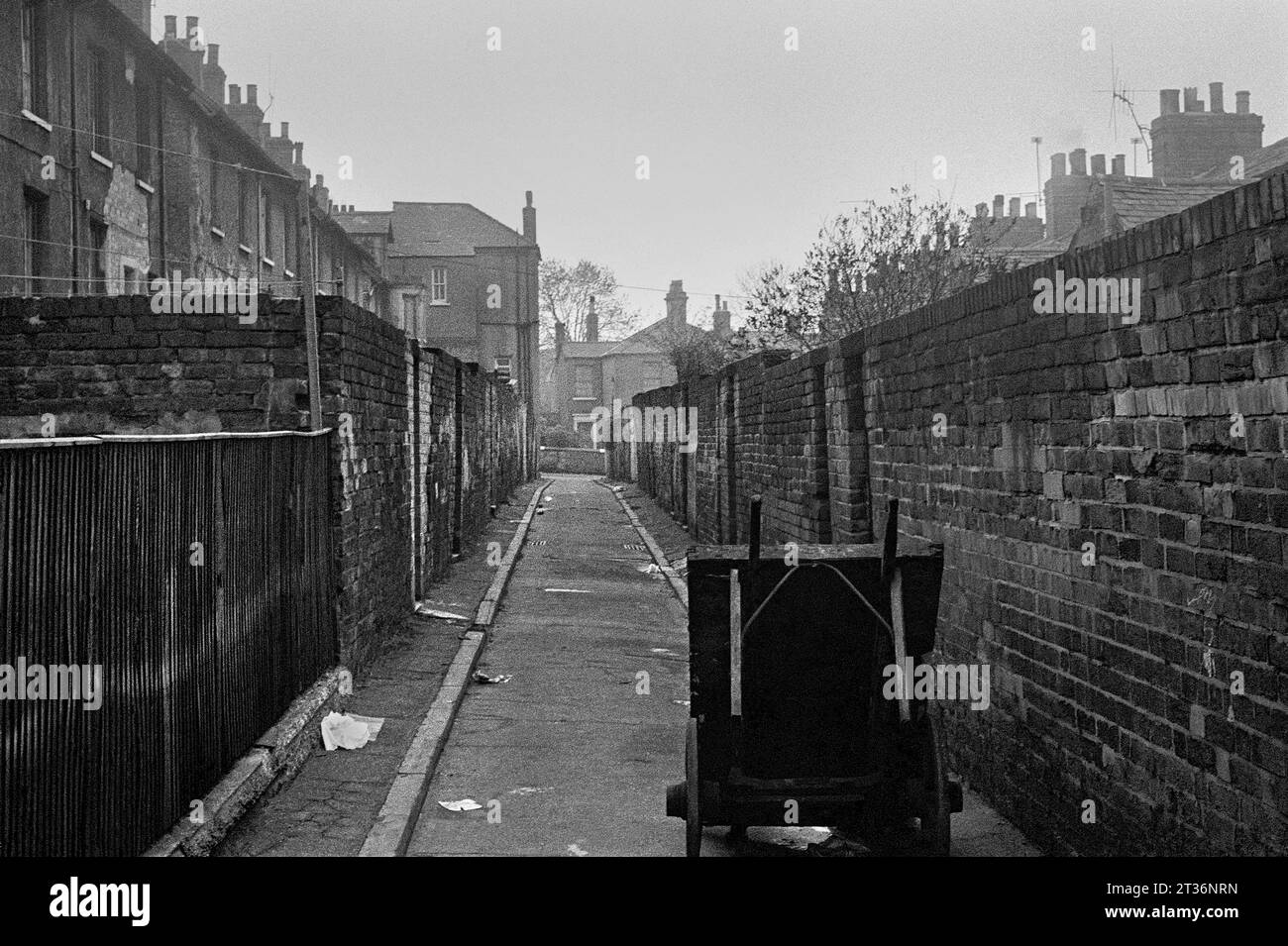 Wooden handcart parked in a back lane between houses on Berkley Street ...