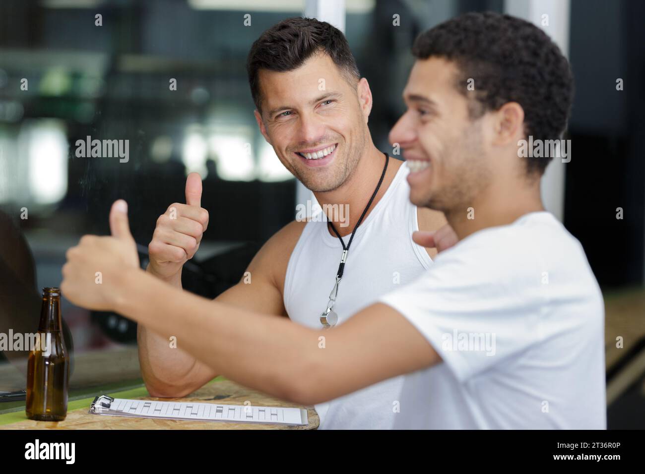 Two men celebrating happy cheering hi-res stock photography and images ...