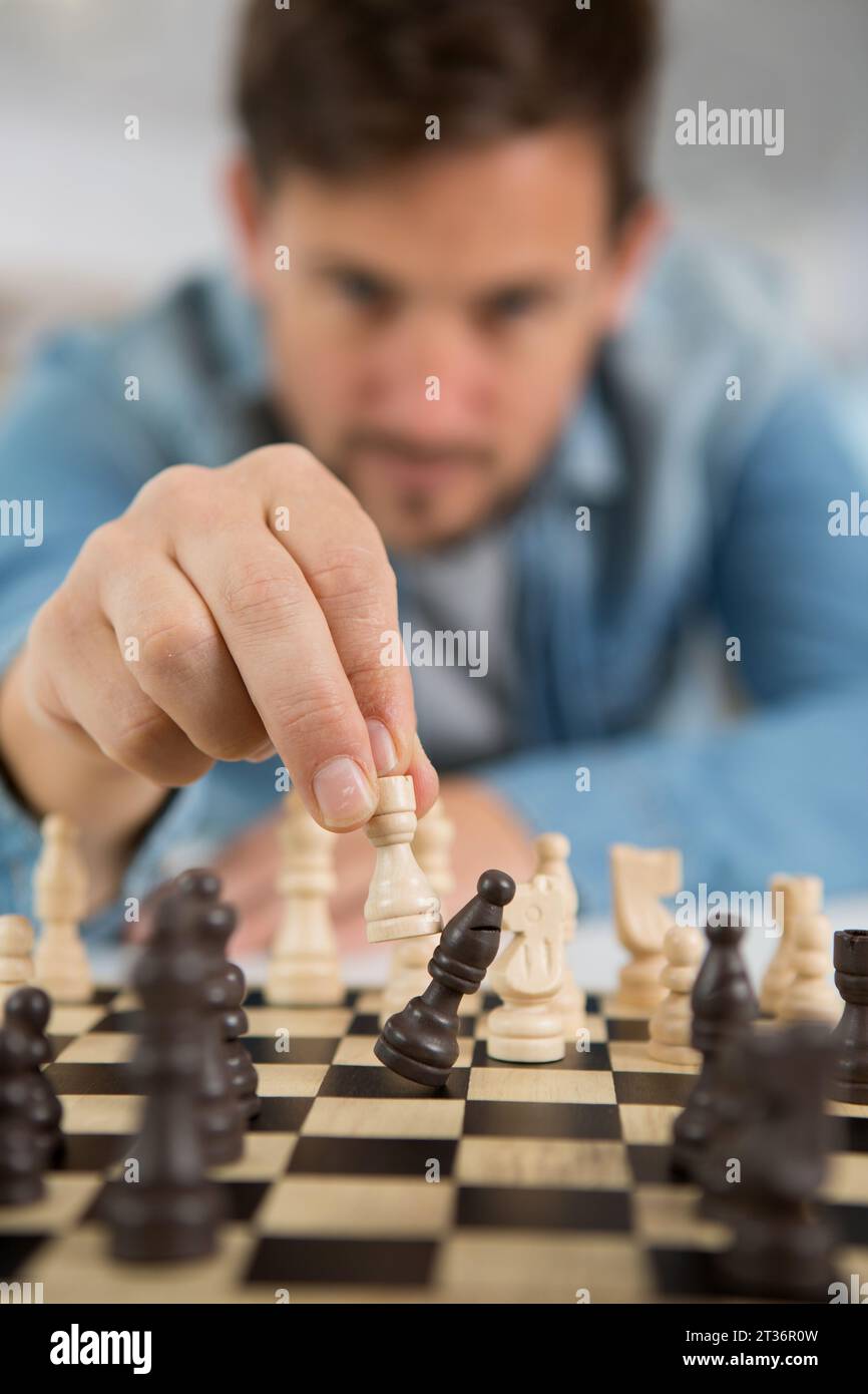 man playing chess close up Stock Photo - Alamy