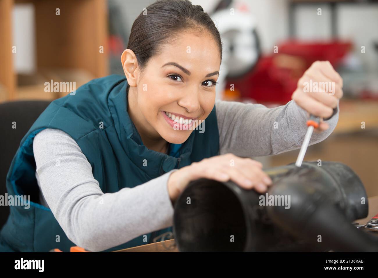 woman installing repair pipes on construction site Stock Photo - Alamy
