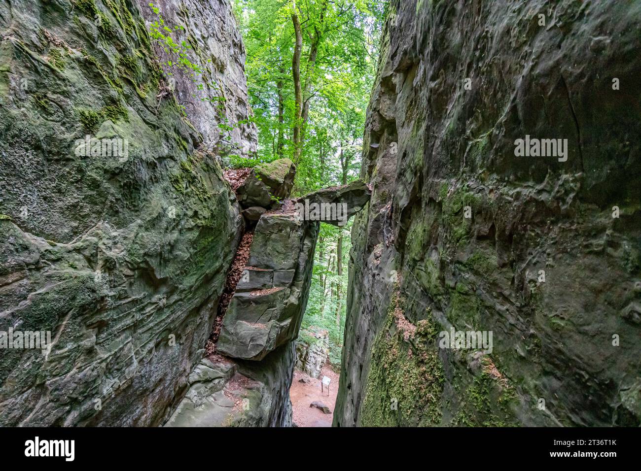Rock stuck in a narrow rocky groove or walls of rock formations with ...
