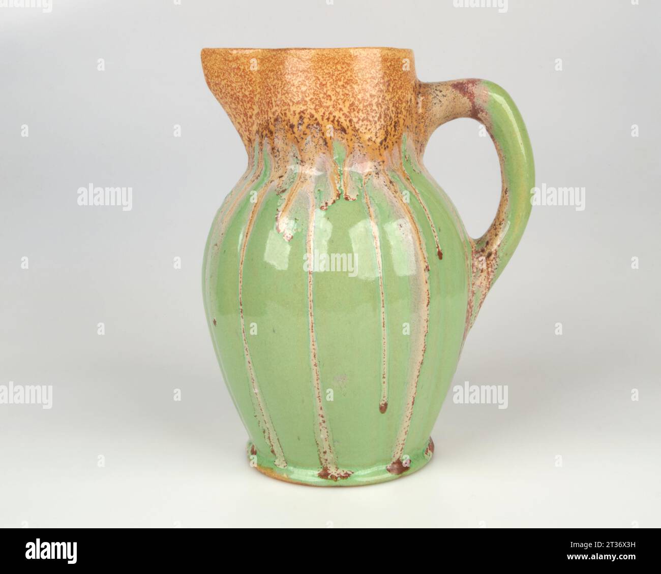 Stylish 1920-30s Art Deco pottery jug running crystalline glaze Stock ...