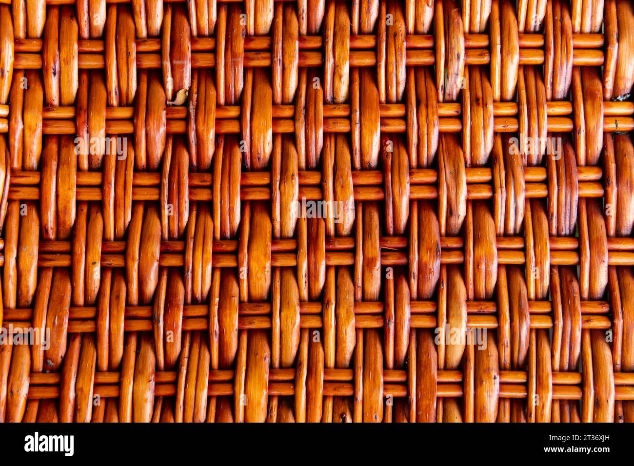 Wicker texture, close-up fragment of a basket made of willow branches ...