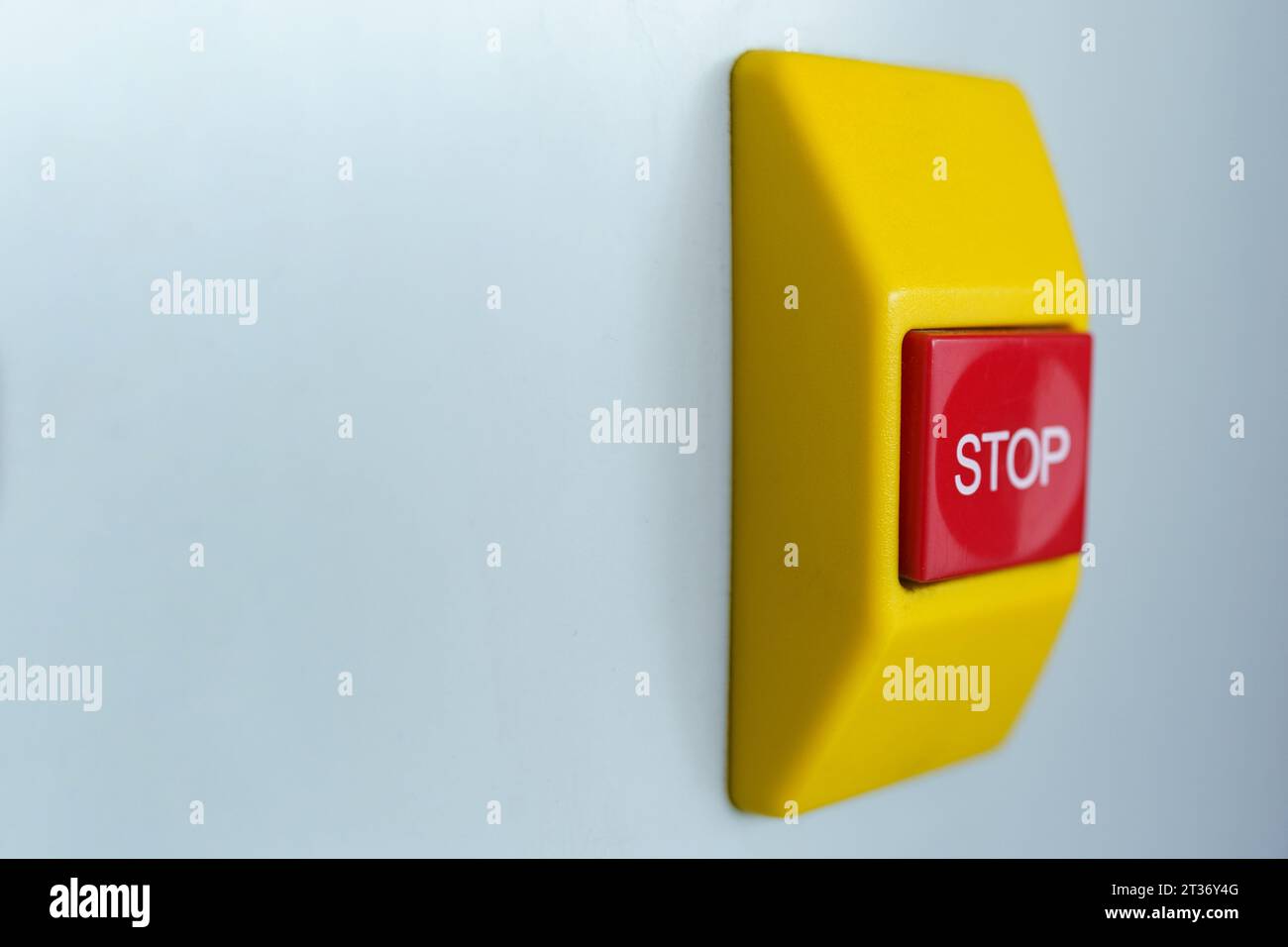 Red emergency stop button for manual pressing. Close-up Stock Photo - Alamy