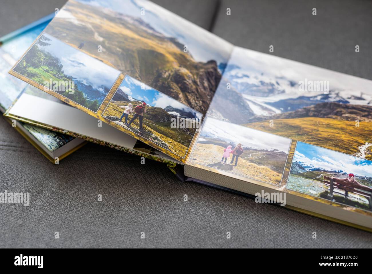Family photos archive saved in brightly designed photo book; bright ...