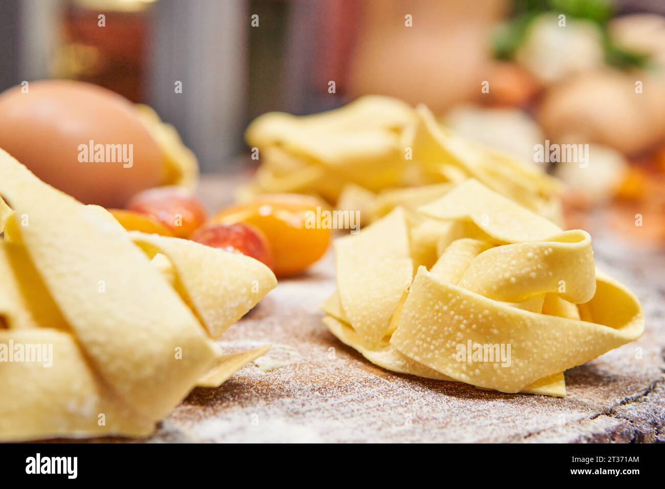 Raw tagliatelle fresh pasta ready to cook Stock Photo - Alamy
