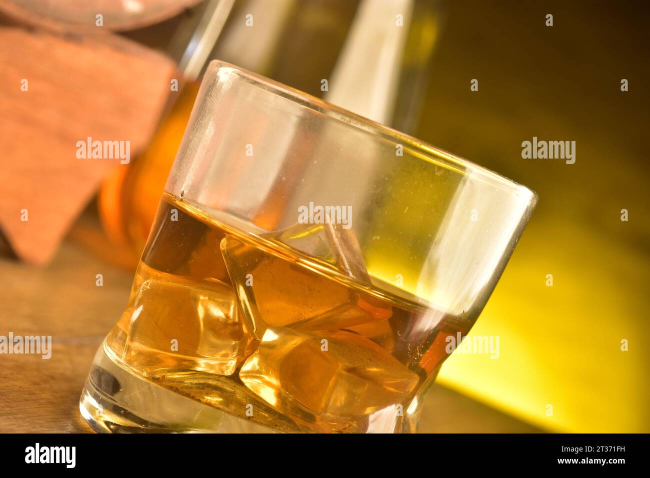 Glass and bottle of whiskey Stock Photo - Alamy