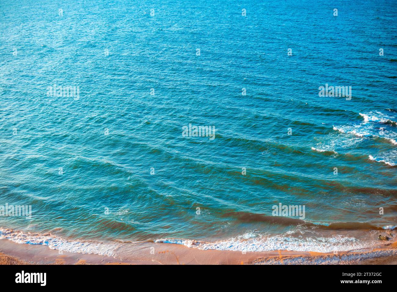 Sea surface with wave and sandy shore. View from above Stock Photo - Alamy