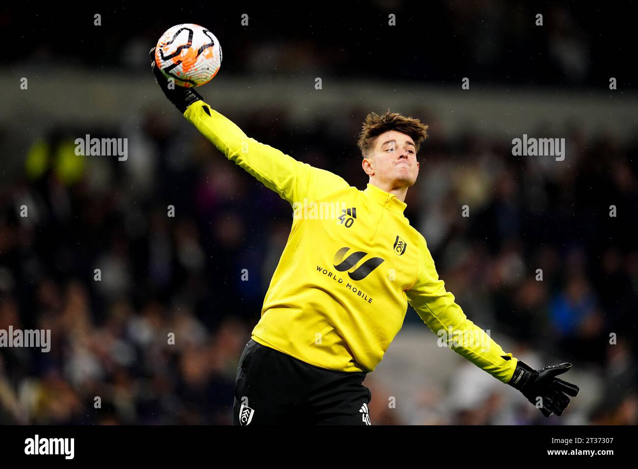 Fulham goalkeeper George Wickens warming up ahead of the Premier League ...