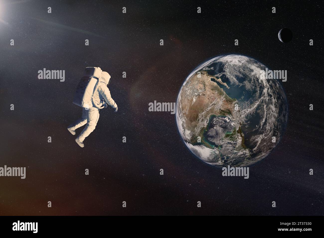 Cosmonaut in outer space against Earth planet. Elements of this image ...