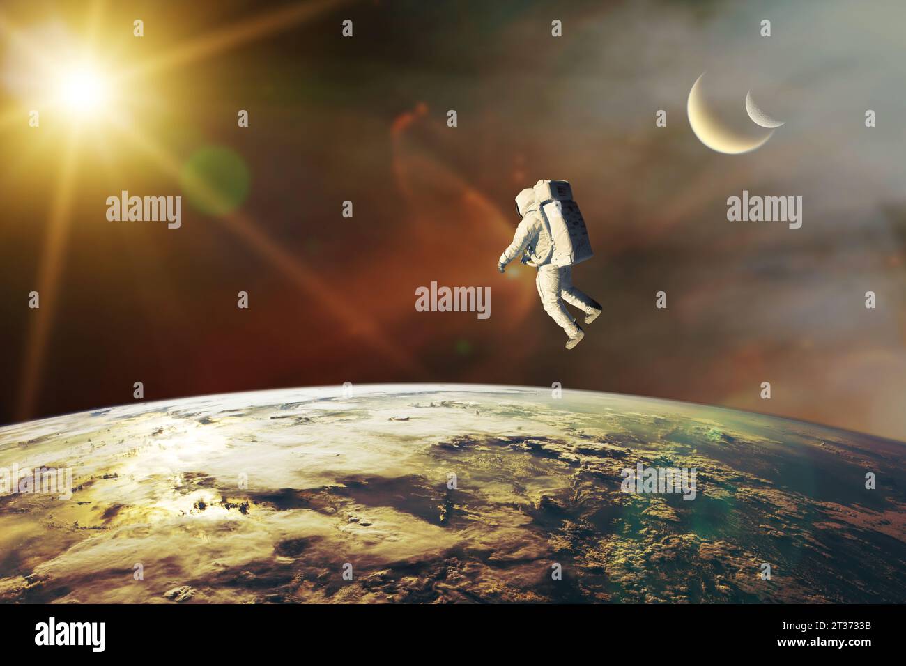 Spaceman on low-orbit of Earth planet with sunlight. Elements of this ...